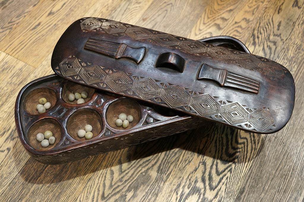 Le jeu d'Awalé - Règles du jeu - Africouleur